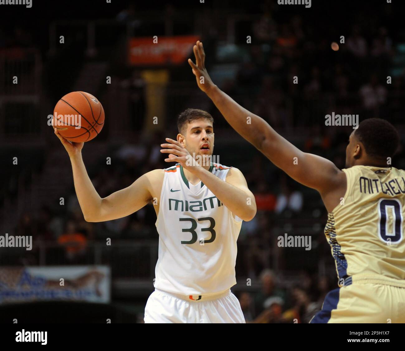 Forward Ivan Cruz Uceda (33) of the Miami Hurricanes looks to pass ...