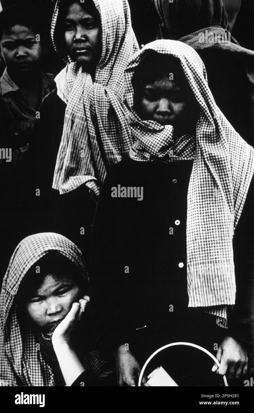 Sakeo Cambodia Khymer Rouge Women wearing Black Pajamas and the red and ...