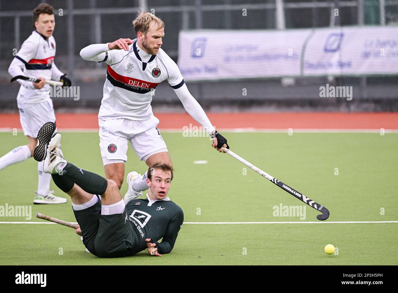 Dragons' Conor Harte and Watduck's Louis Depelsenaire fight for the ...