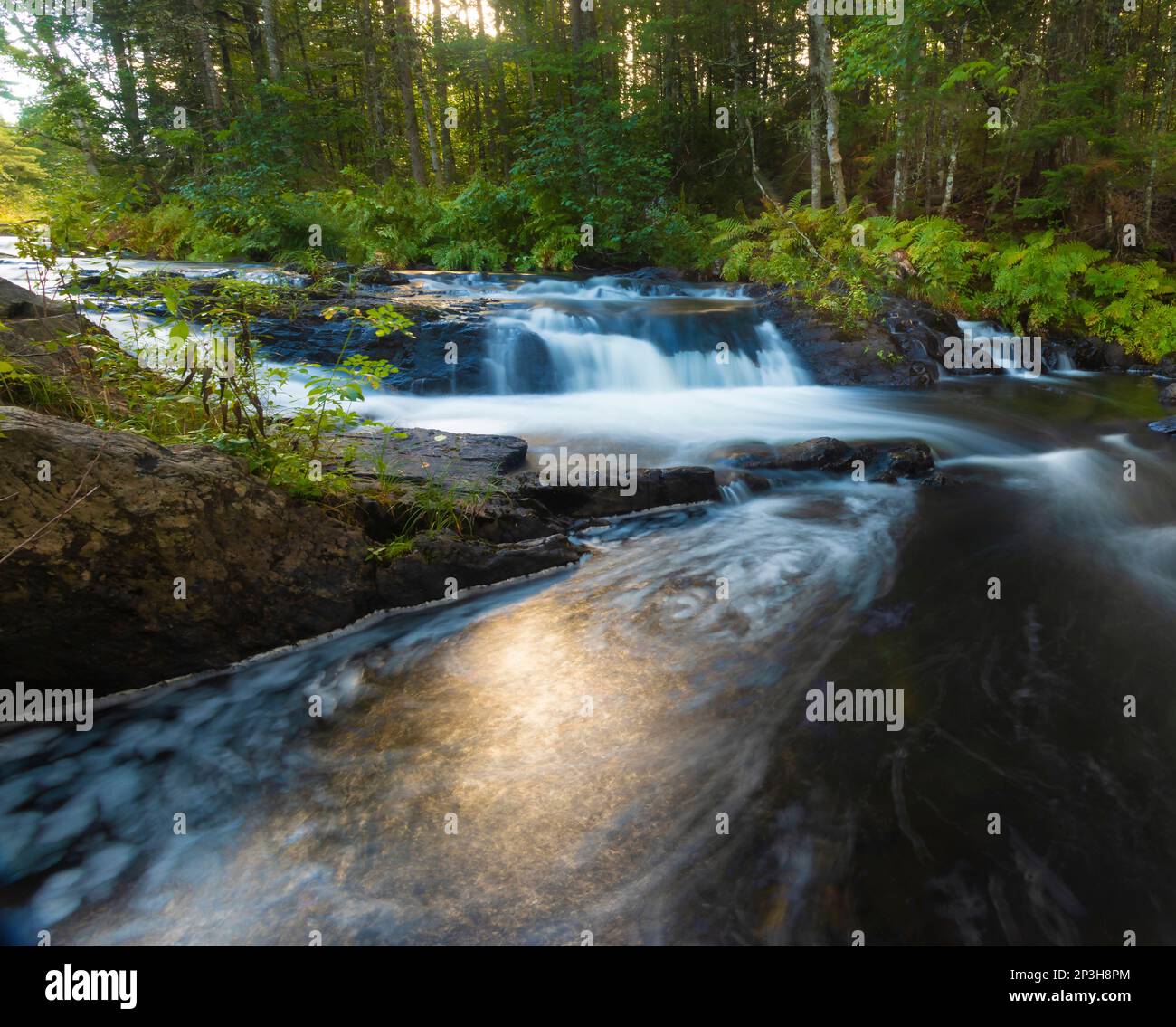 Northeern Main Waterfall and pool of water in early September with sun ...