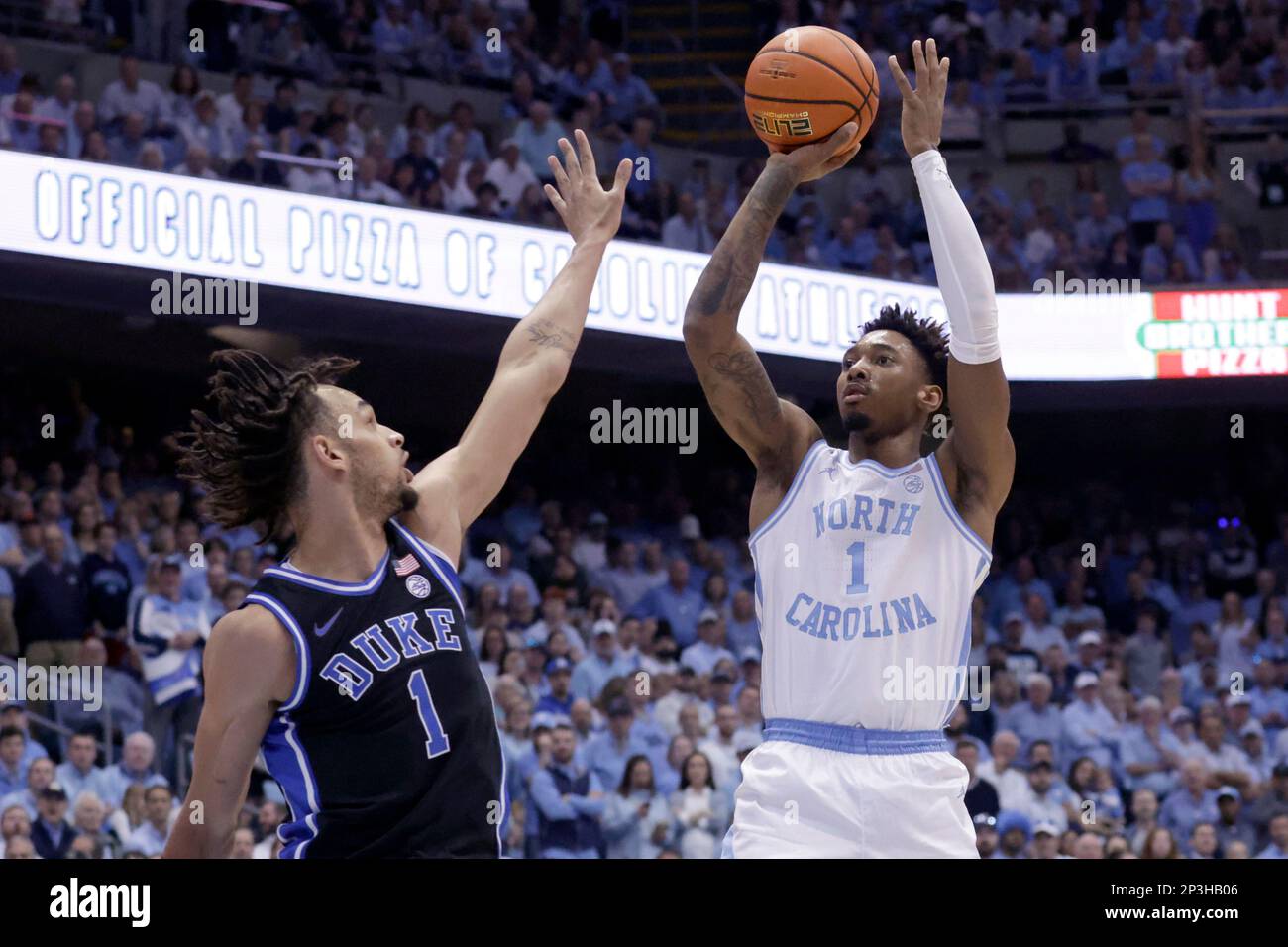North Carolina forward Leaky Black (1) is defended by Duke center ...