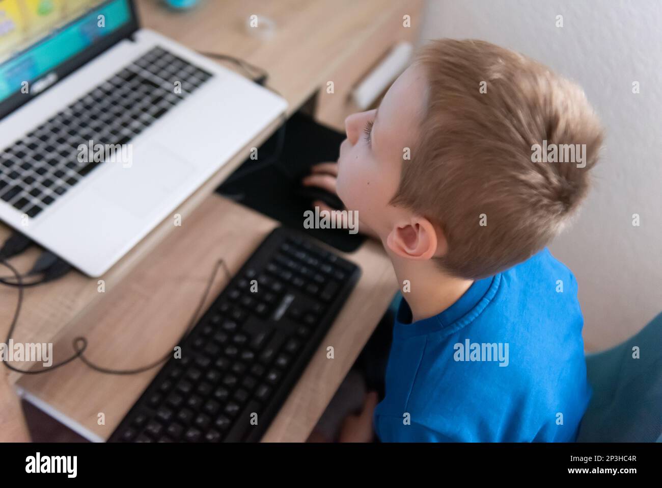 Teenage boy computer games laptop home hi-res stock photography and ...