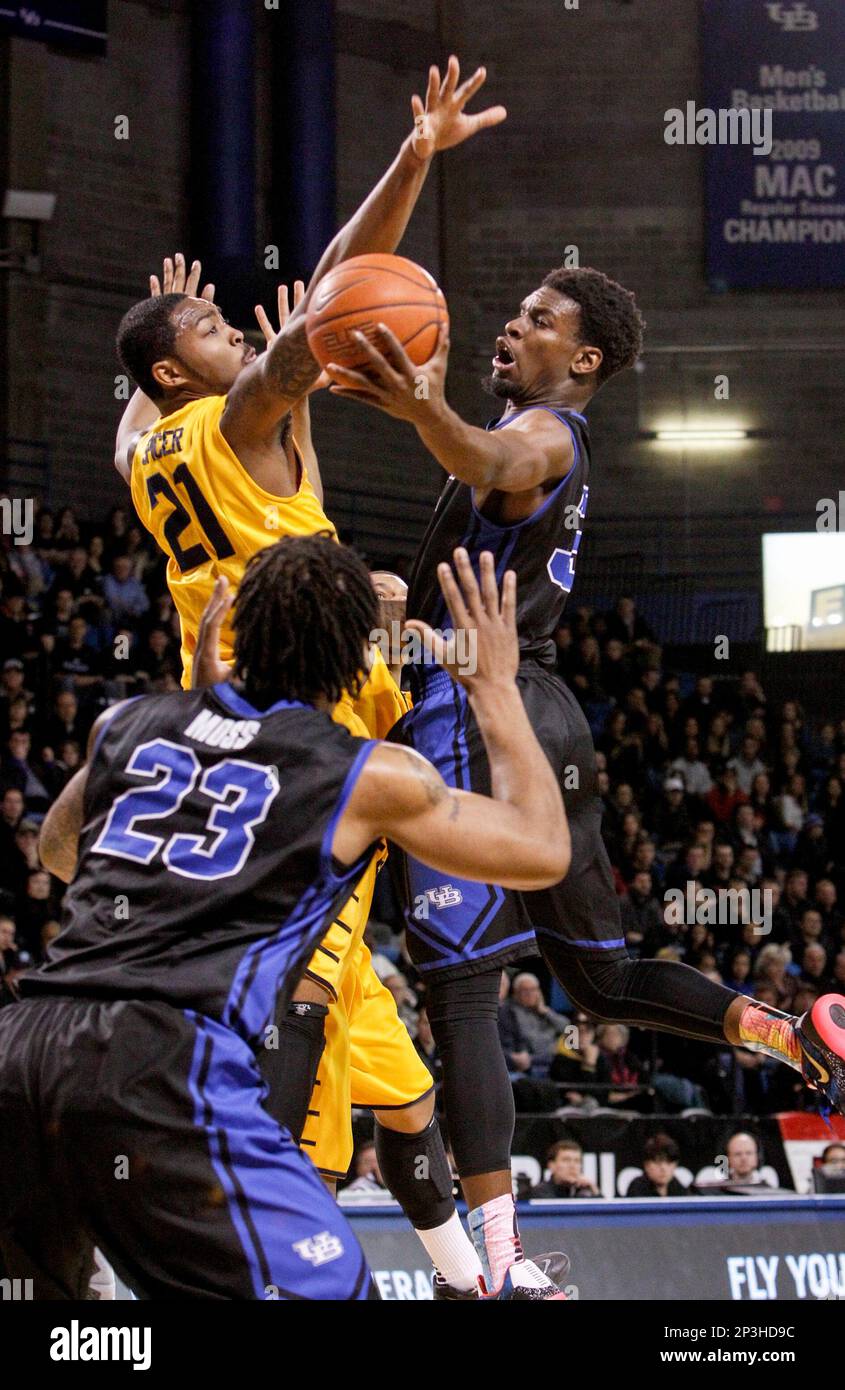 Buffalo Bulls forward Xavier Ford (35) attempts to get a shot around ...