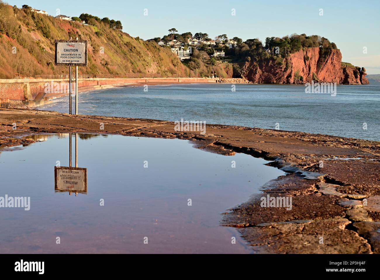 Reflections in a large puddle at Sprey Point, Teignmouth, looking ...