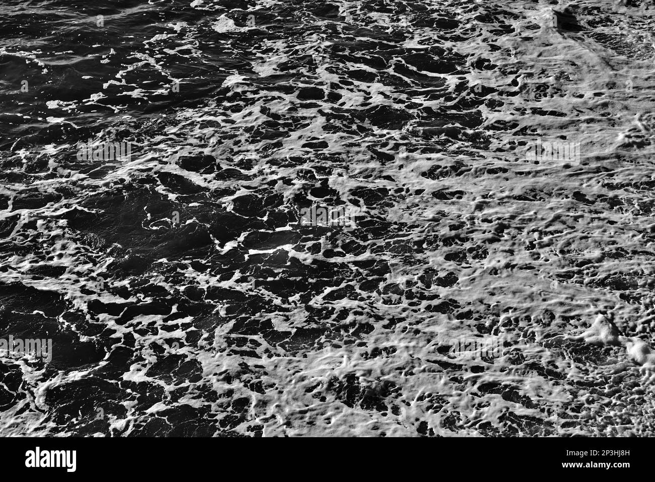 Foaming sea on the beach at Teignmouth, South Devon Stock Photo - Alamy