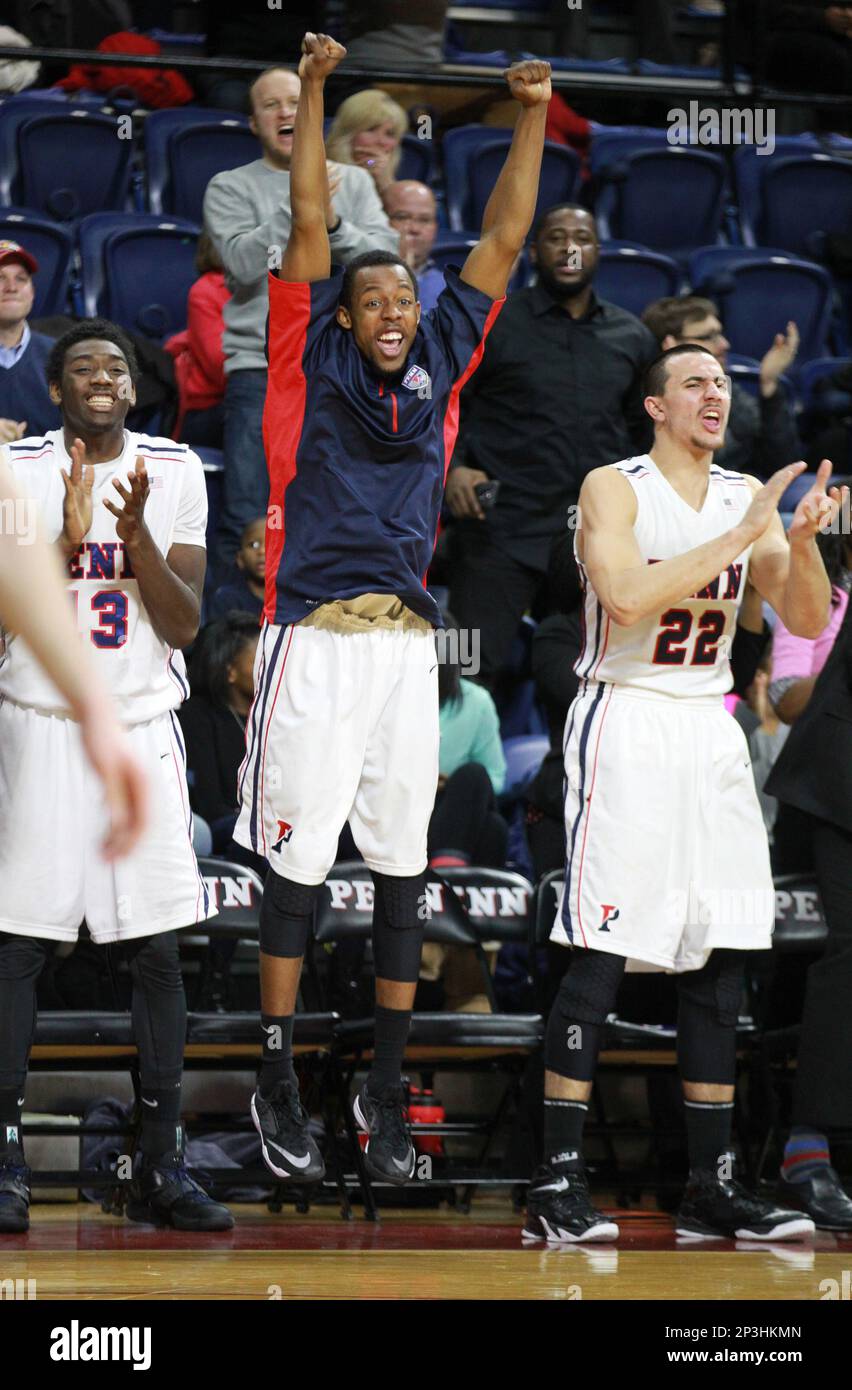 The Penn bench, including Camryn Crocker, center, celebrates after a ...