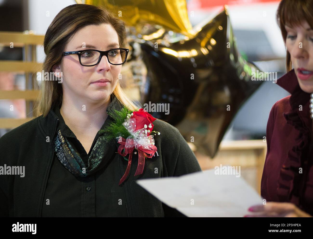Johanne Luth reads a letter from State Rep. Charles Brunner nominating ...