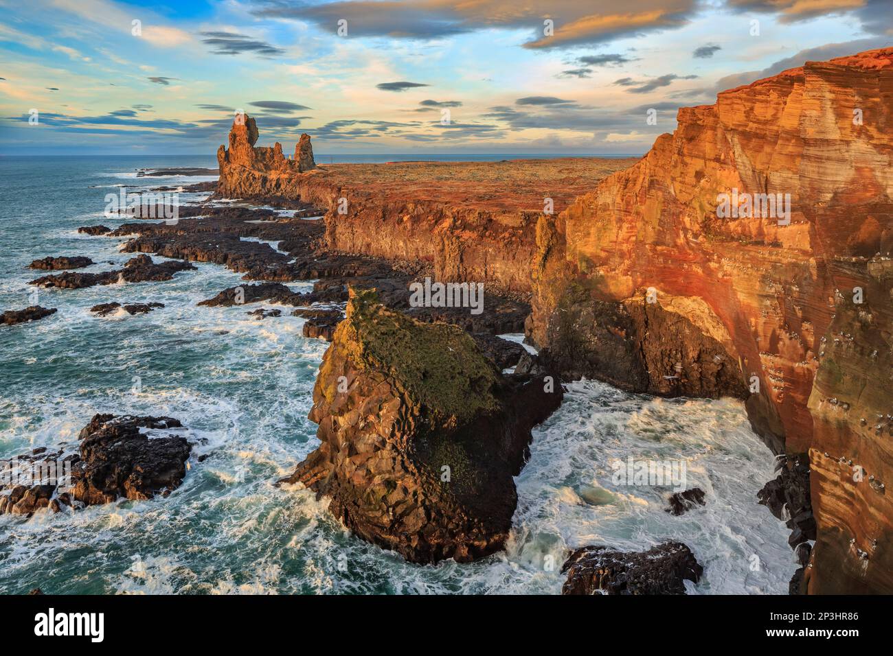 Basalt rocks of Lóndrangar, Malarrif Lighthouse, Iceland Stock Photo ...