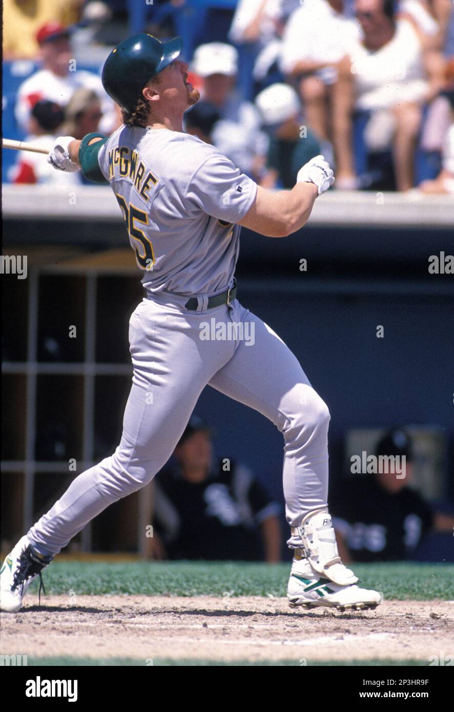 Oakland A's Mark McGwire (25) during a game from his 1996 season ...