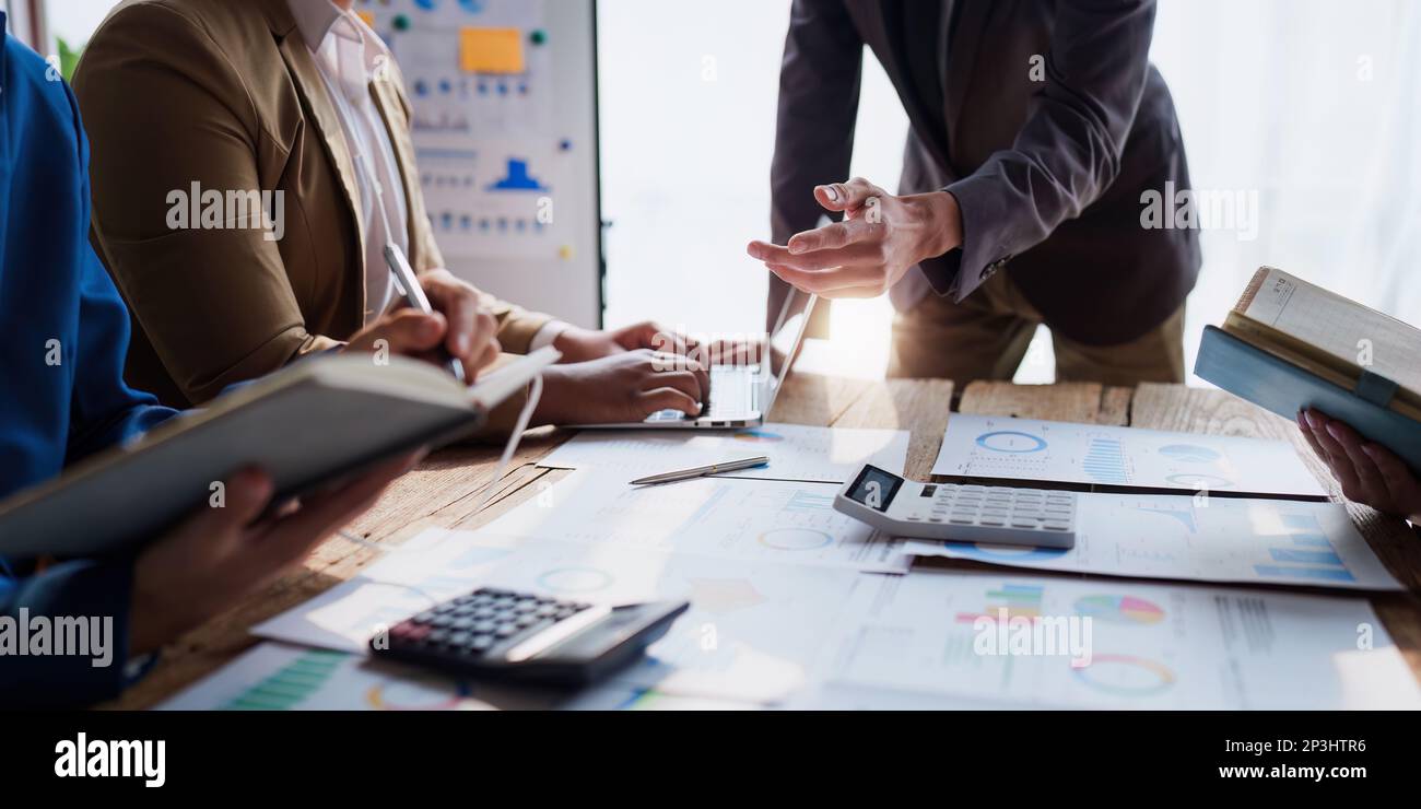 Business team working with financial document at office. analysis ...