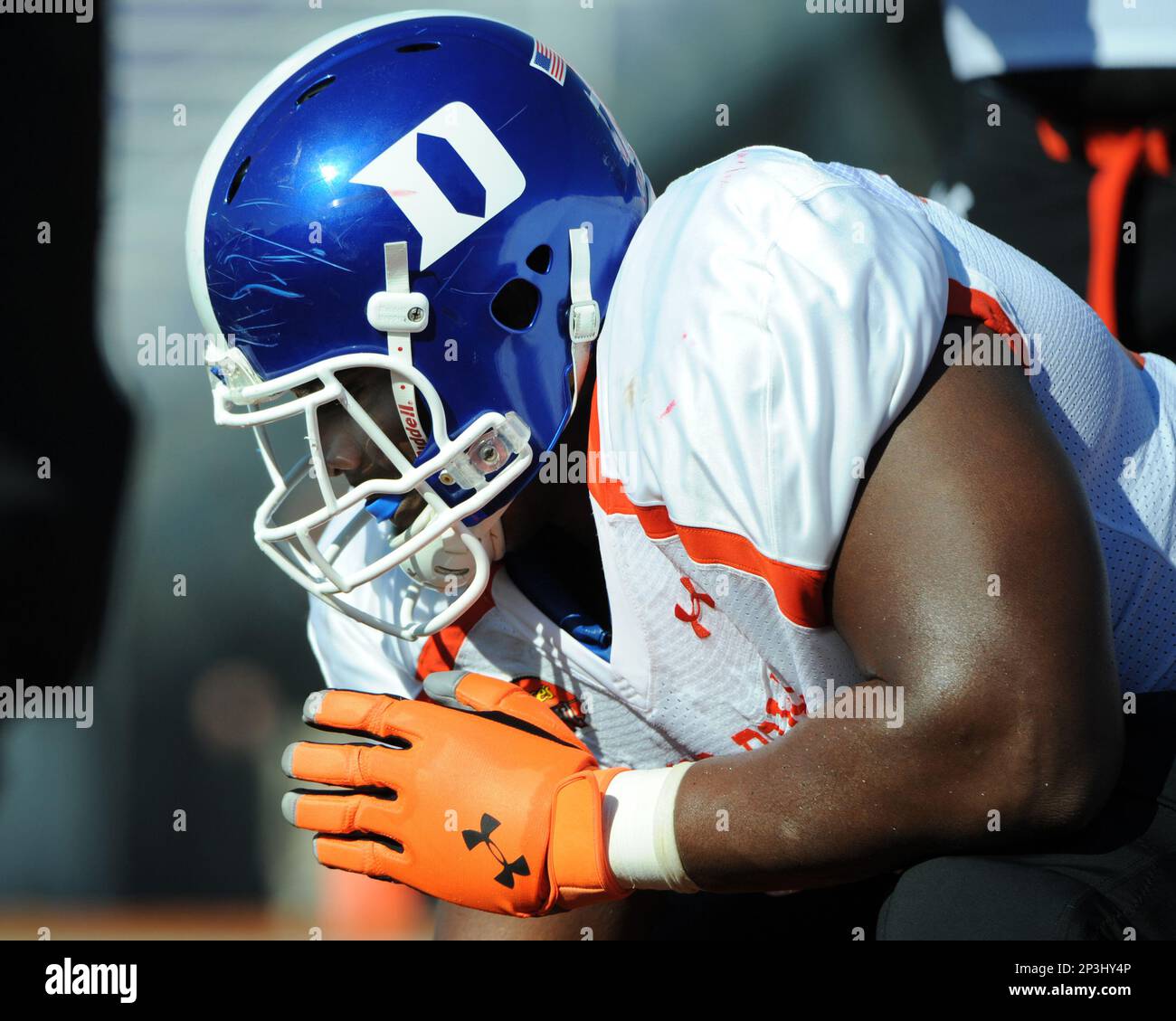 Offensive lineman Laken Tomlinson (77) of Duke sets to block during a ...