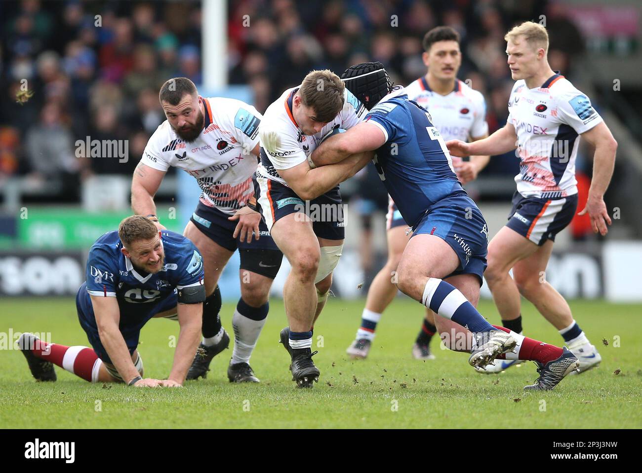 Saracens' Theo Dan is tackled by Sale Sharks' Bevan Rodd during the ...