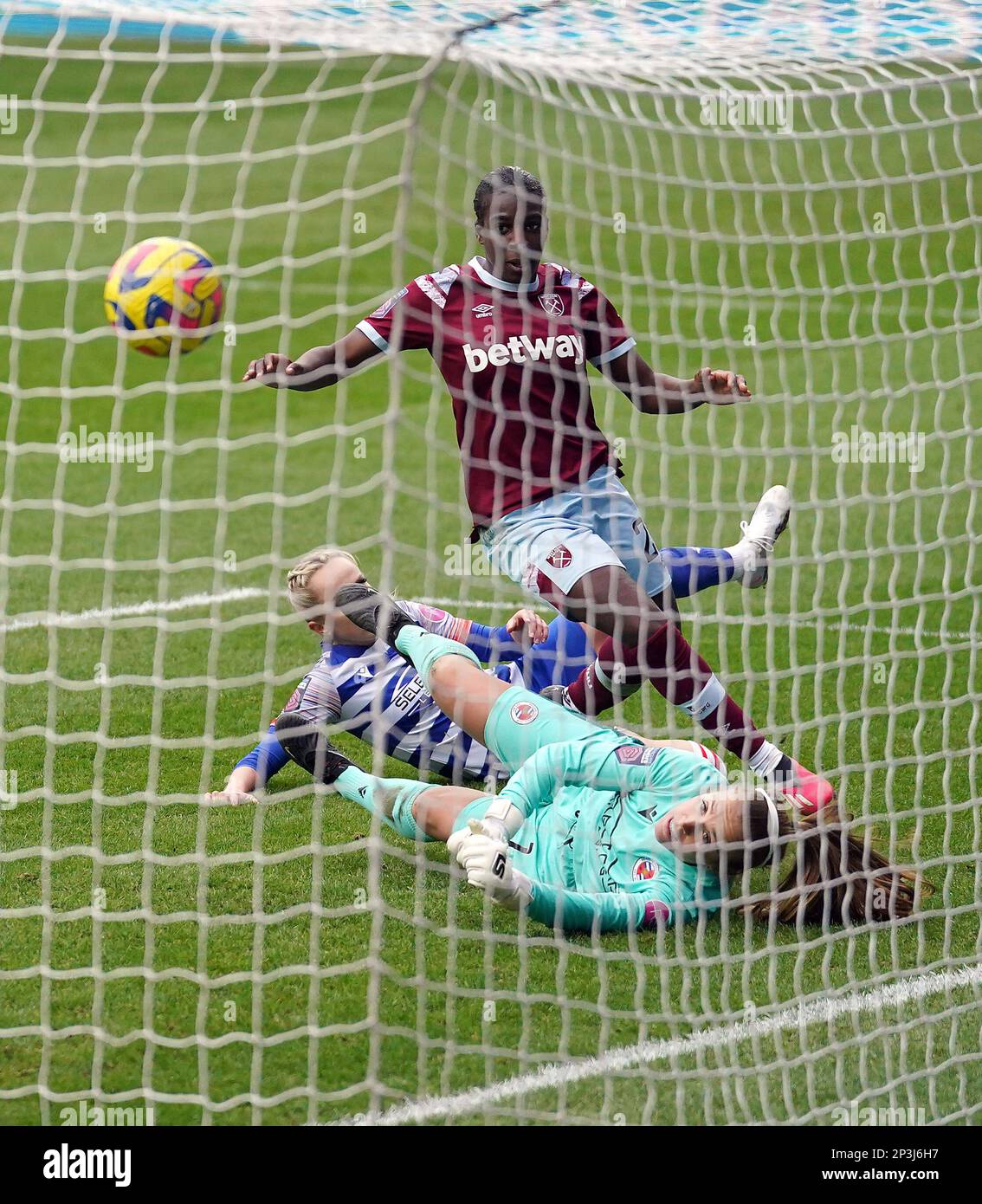 West Ham United's Viviane Asseyi scores their side's first goal of the ...