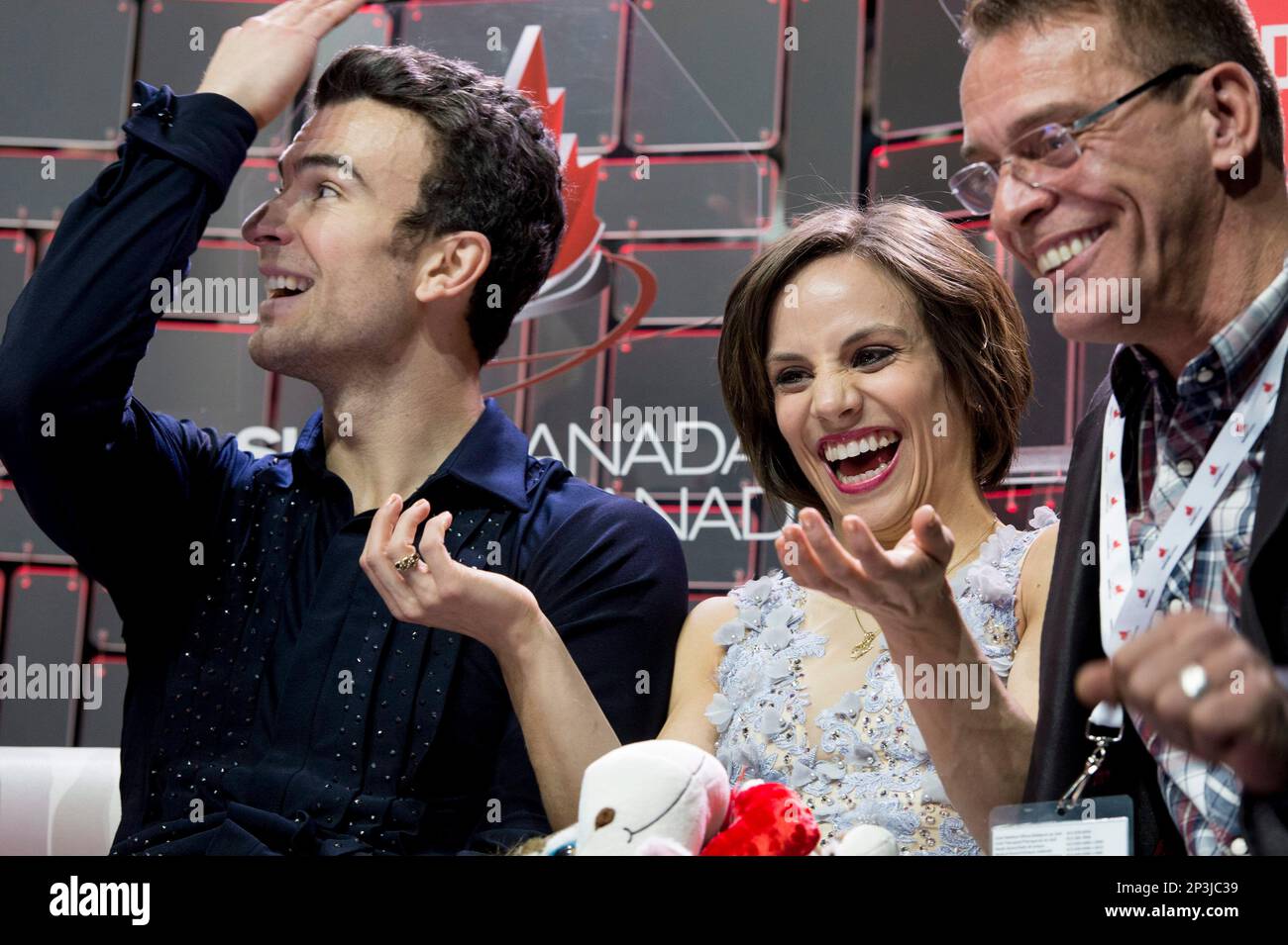 Meagan Duhamel, her partner Eric Radford, left, and their coach ...