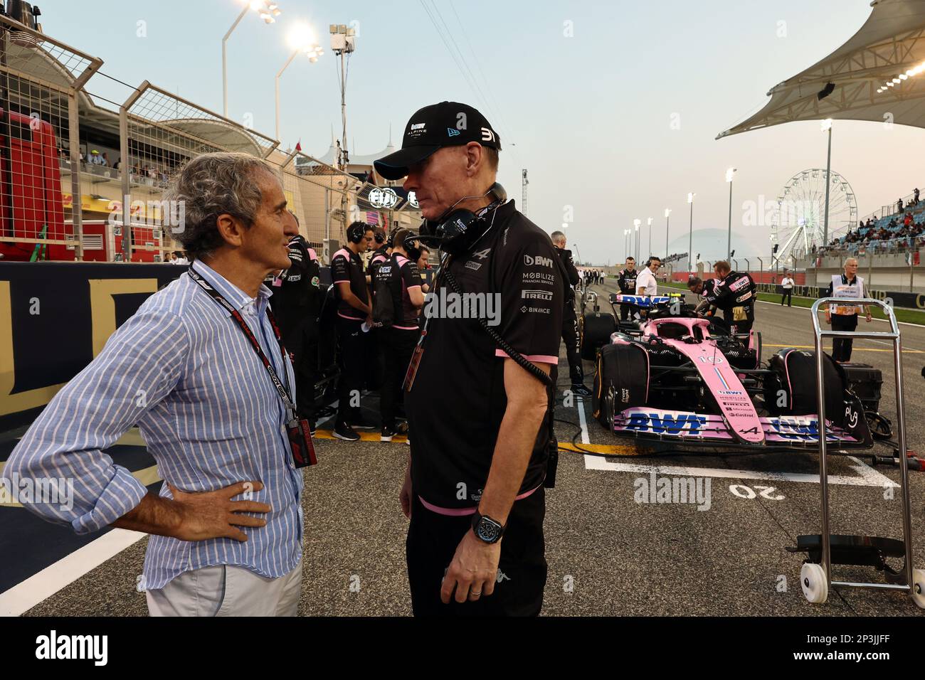 (L to R): Alain Prost (FRA) with Alan Permane (GBR) Alpine F1 Team Trackside Operations Director ...