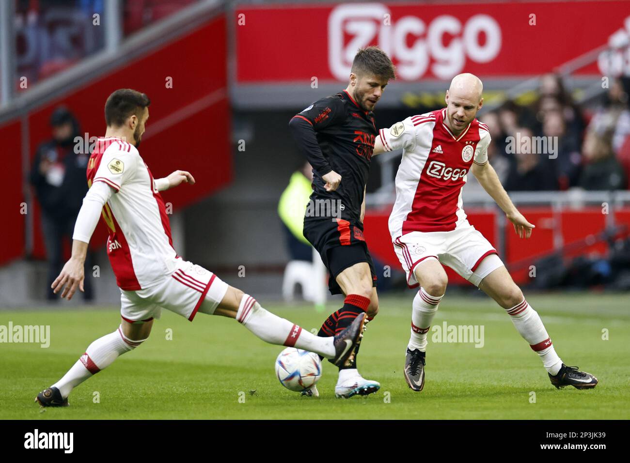 AMSTERDAM - (lr) Dusan Tadic of Ajax, Lasse Schone of NEC Nijmegen, Davy Klaassen of Ajax during ...