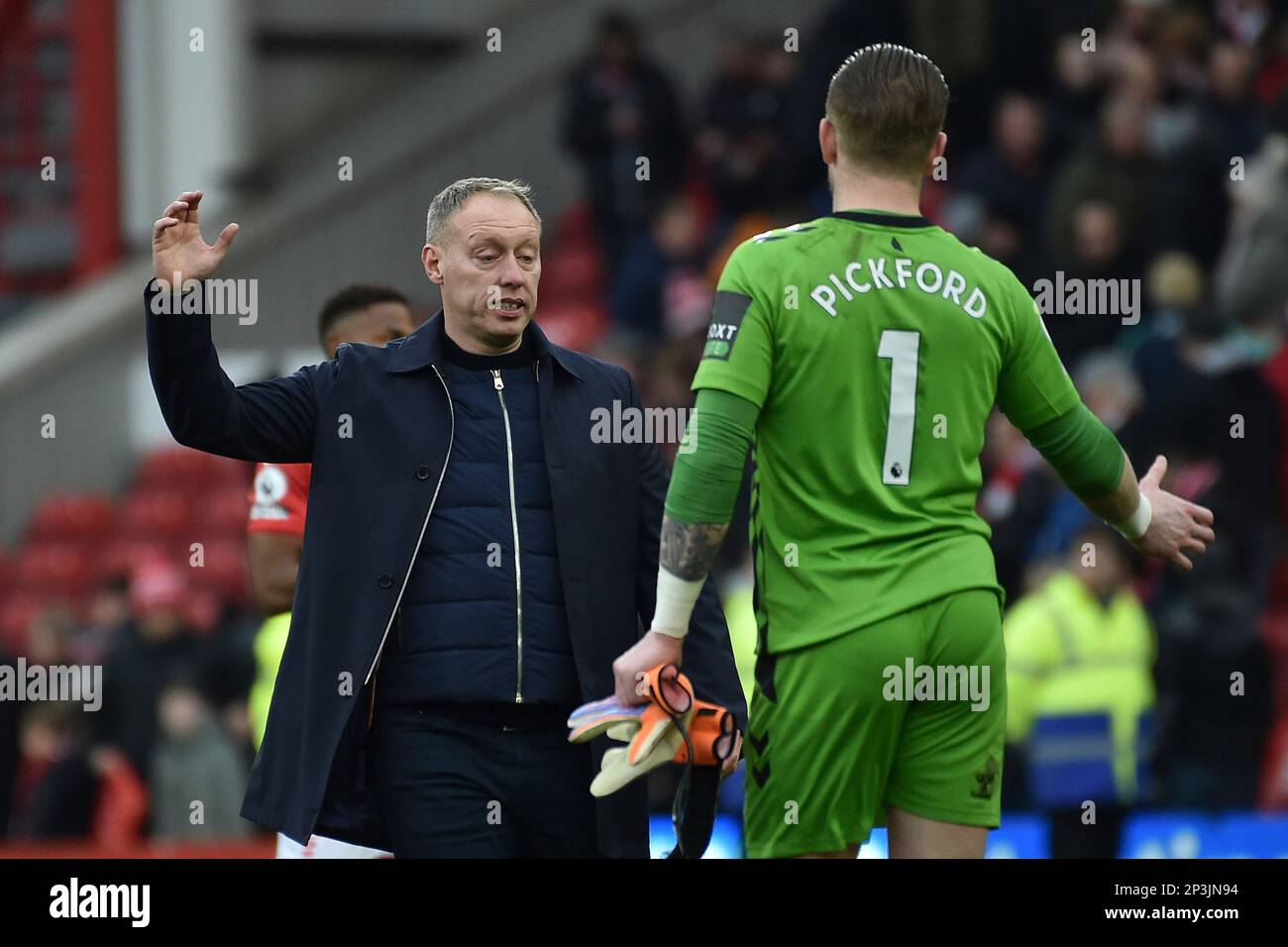 Nottingham Forest's head coach Steve Cooper, left, goes to shake hands ...