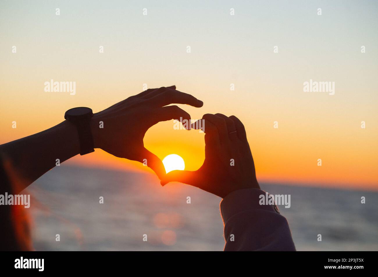 Hand Heart Sunset