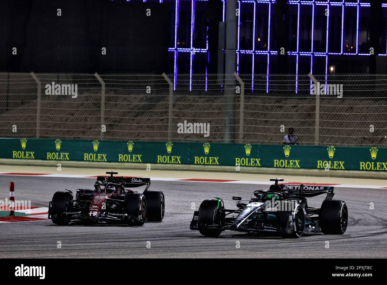 Valtteri Bottas (FIN) Alfa Romeo F1 Team C43 and George Russell (GBR ...
