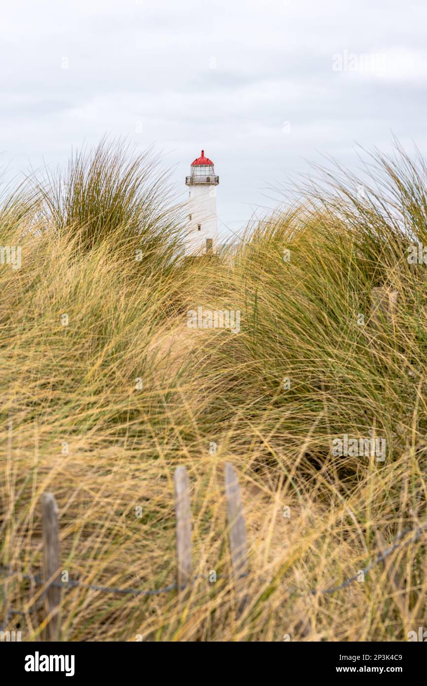 Talacre beach Point of Ayr light house peaking out above sand dunes and ...