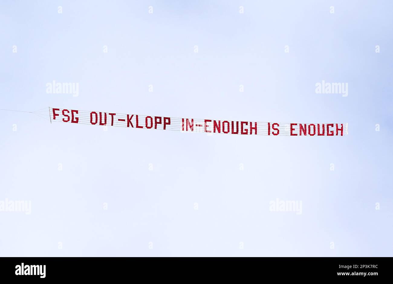 A banner is flown over the stadium reading 'FSG OUT - KLOPP IN - ENOUGH ...
