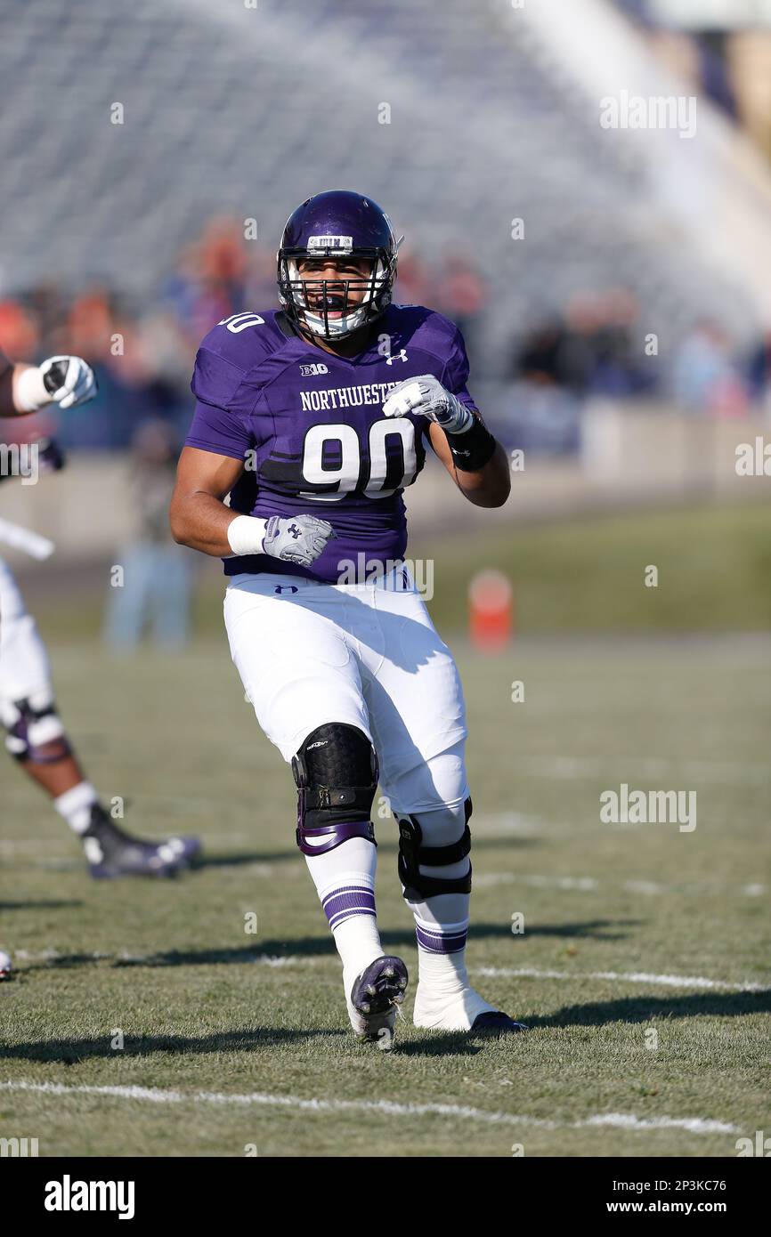 Northwestern defensive lineman C.J. Robbins (90) runs during a NCAA ...
