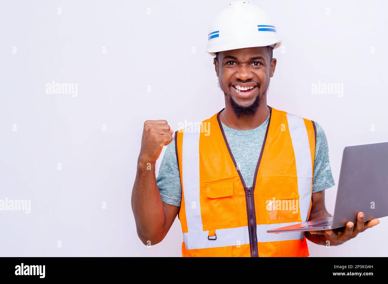 Cheerful Builder Holding Digital Tablet Smiling Looking Aside Posing On ...
