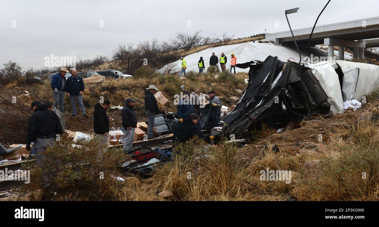 Authorities investigate the scene of a prison bus crash, Wednesday, Jan ...