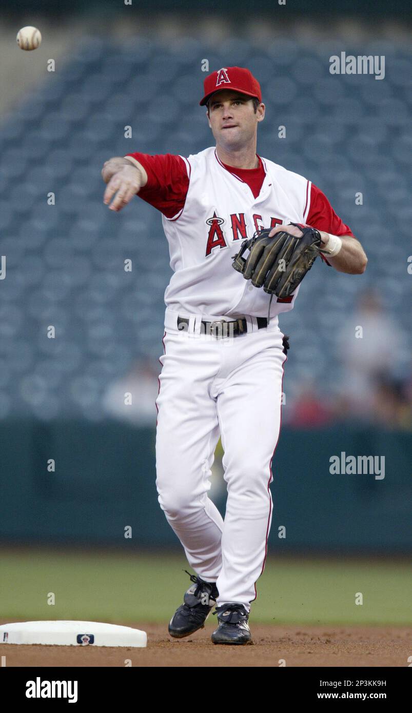 Adam Kennedy of the Los Angeles Angels makes a throw during a 2002 MLB ...