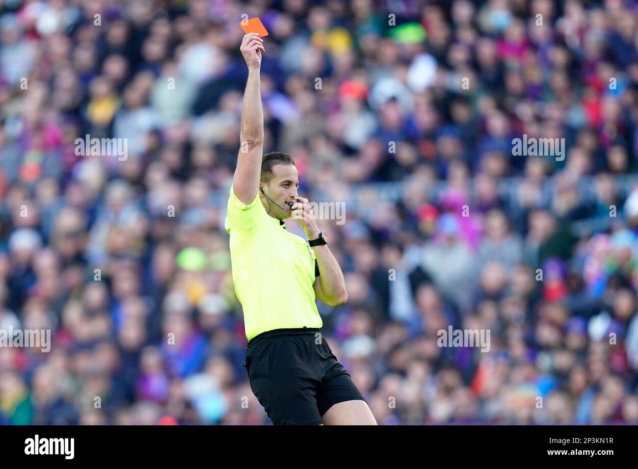 The referee shows red card to Ronald Araujo of FC Barcelona during the ...
