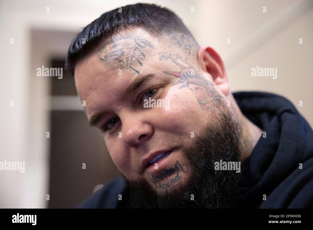 Rapper Forgiato Blow is seen with patriotic tattoos on his face during ...