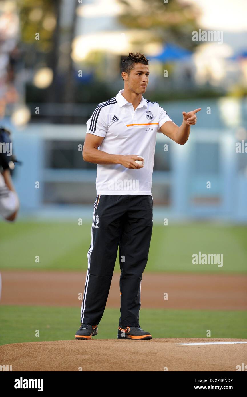 31 July 2013: Real Madrid star Cristiano Ronaldo throws out the ...