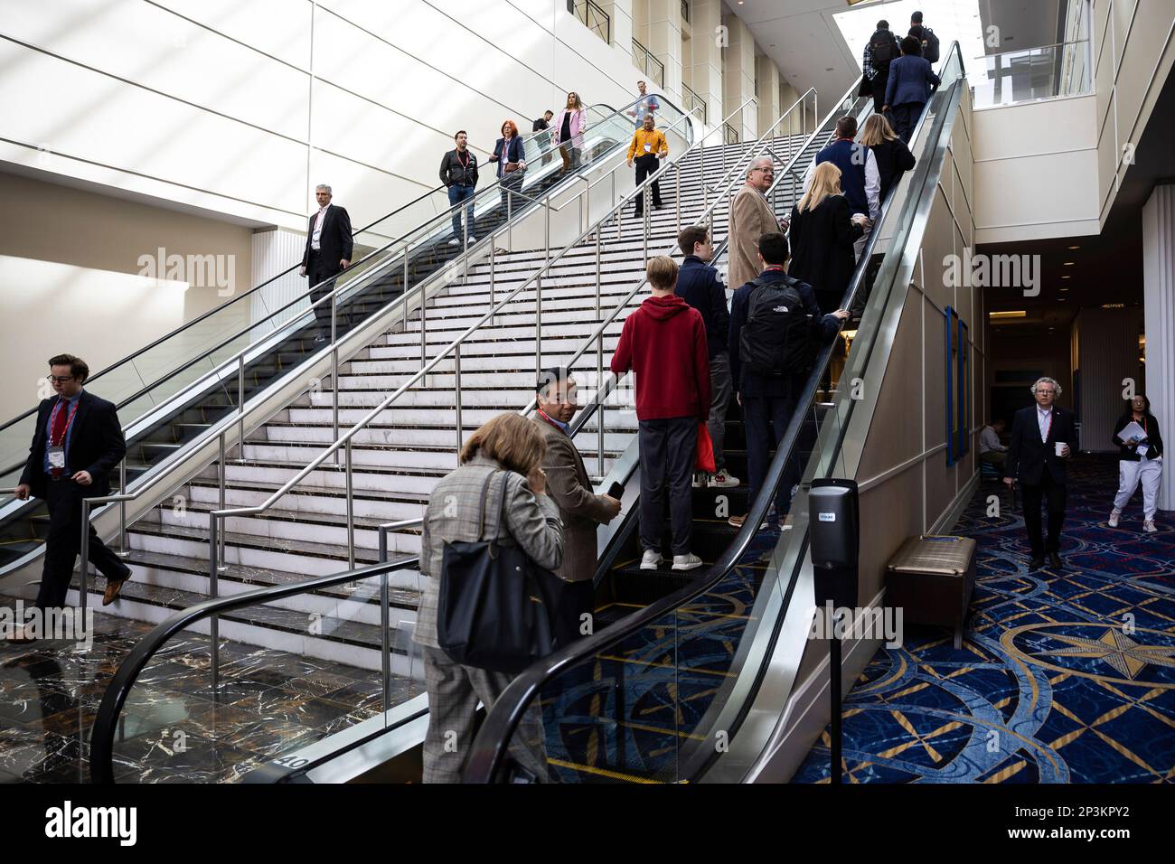 People use escalators at the Conservative Political Action Conference ...
