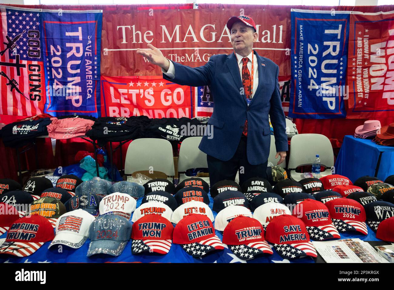 Ronald Solomon works at his merchandise stand at the Conservative ...