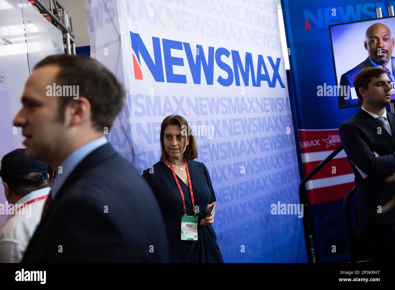 Stephanie Cassidy and other people are seen at the Newsmax booth at the ...