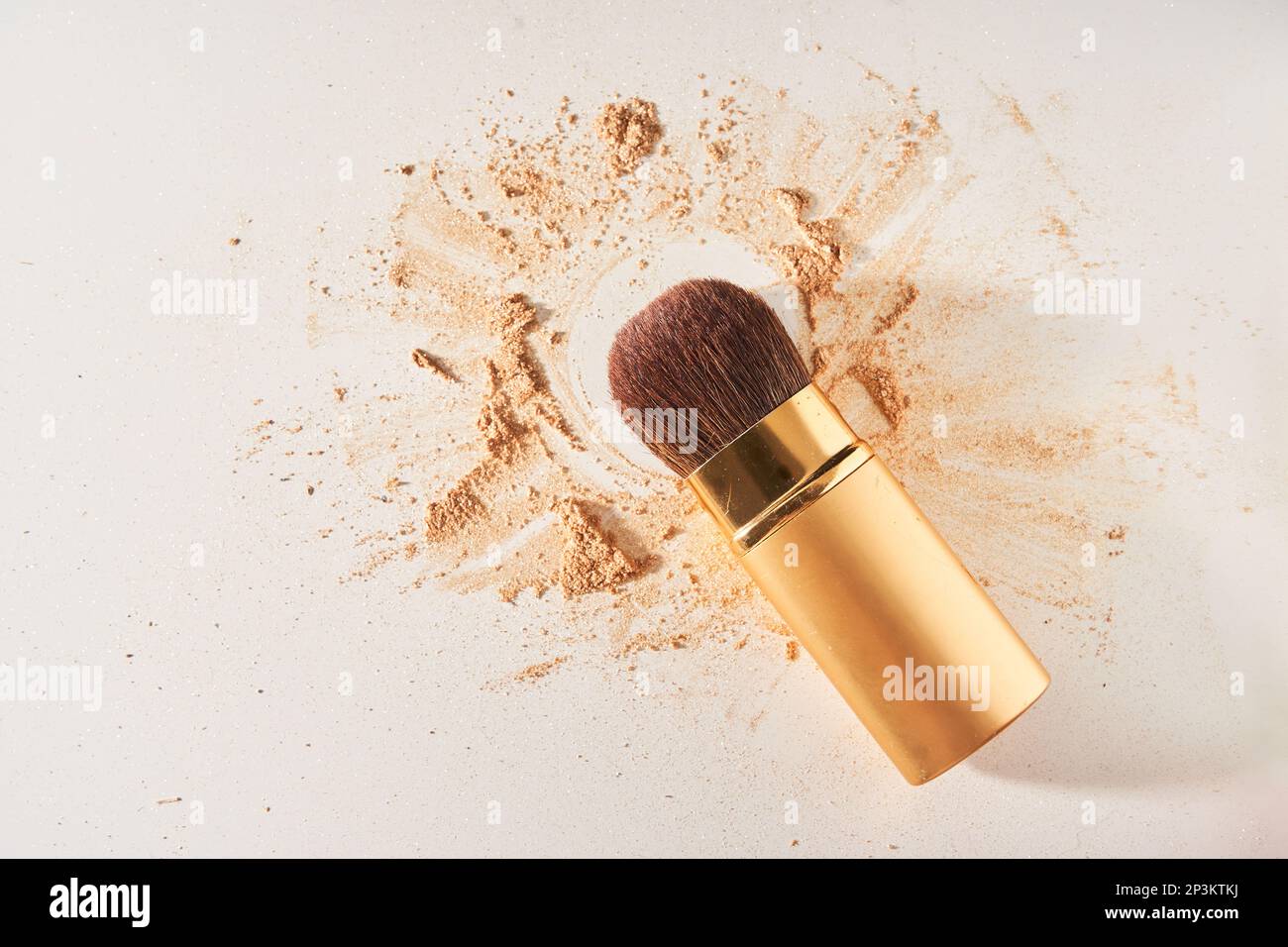 Soft cosmetic brush, with shining sparkling powder on the bristles.The ...