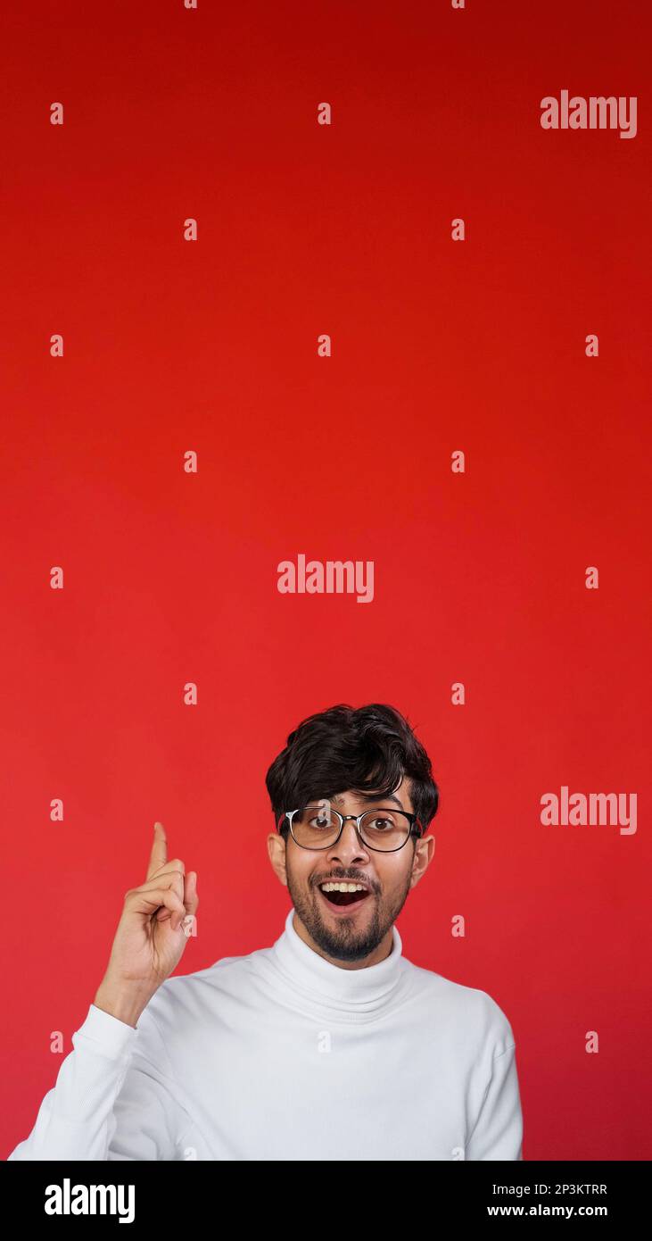 Wow idea creative insight inspired man pointing up Stock Photo - Alamy