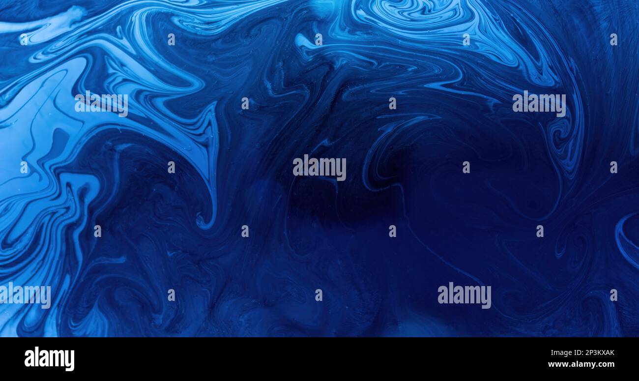 Ink water fluid mix marble texture blue oil paint Stock Photo - Alamy