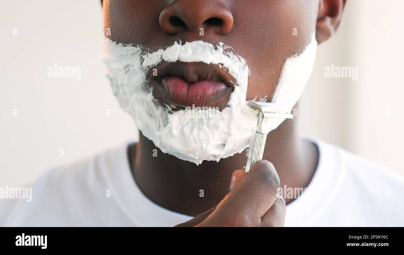Face shaving male grooming man skin foam razor Stock Photo - Alamy