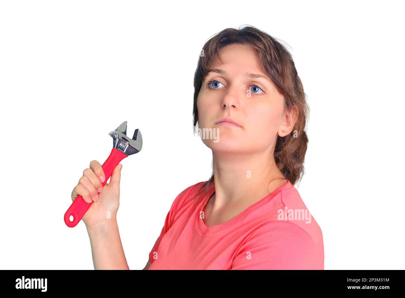 A woman with a wrench in her hand pondered next to the water pipes ...