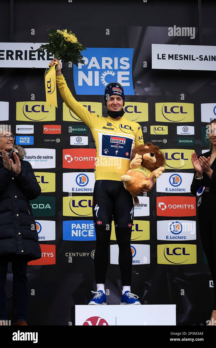 Soudal Quick-Step's Belgian rider Tim Merlier reacts on the podium ...