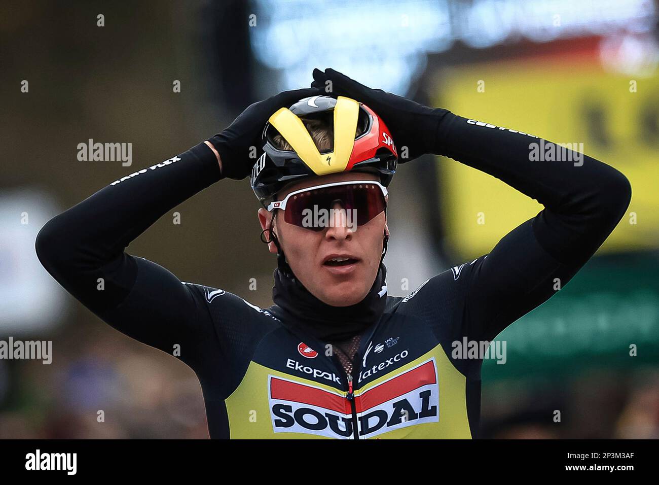 Soudal Quick-Step's Belgian rider Tim Merlier crosses the finish line ...