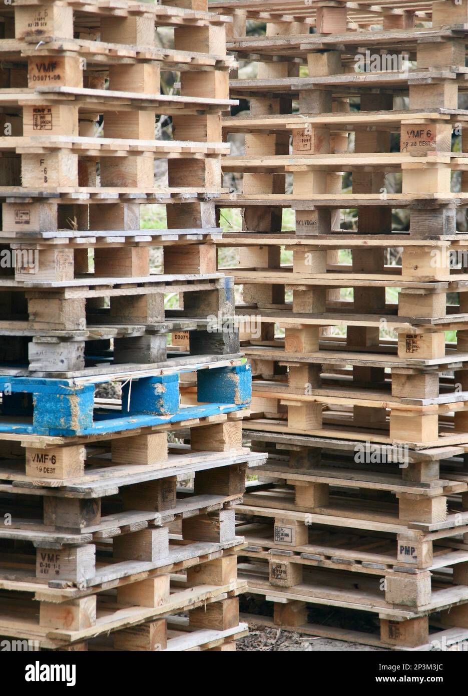 A huge stack of wooden pallets in the farmyard Stock Photo - Alamy