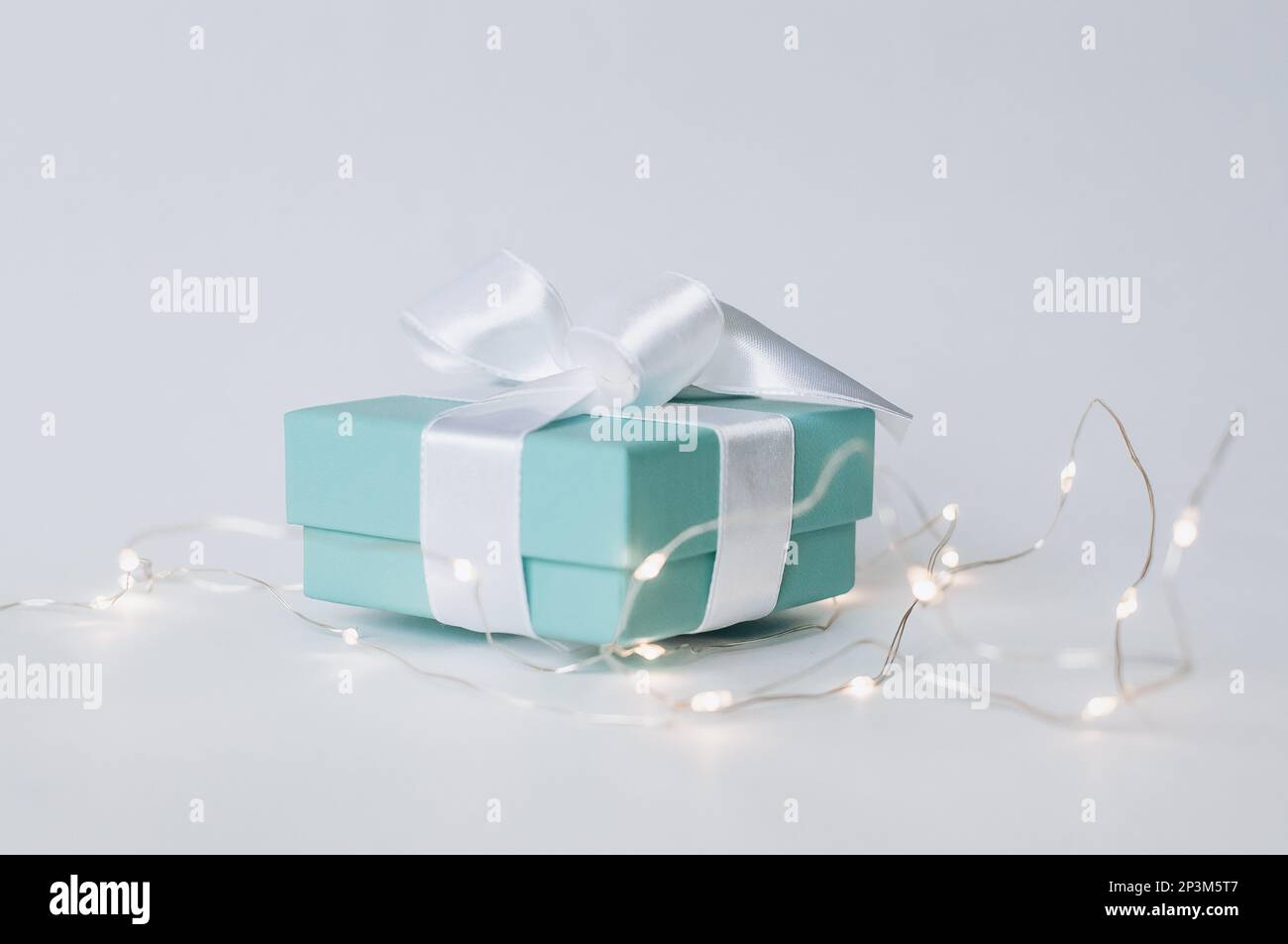Tiffany blue box white ribbon hi-res stock photography and images - Alamy