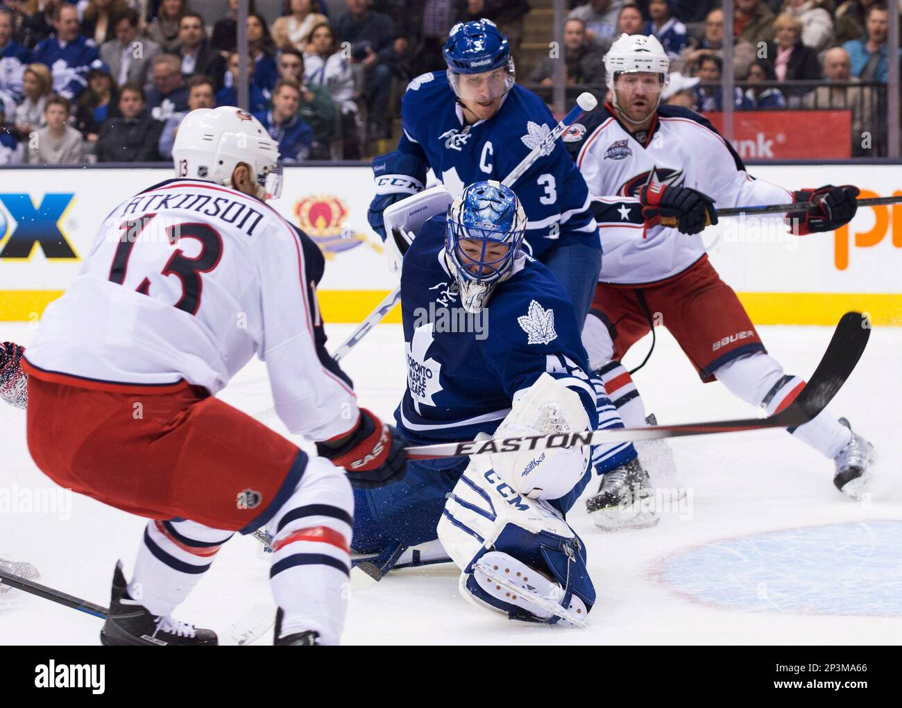 Toronto Maple Leafs goaltender Jonathan Bernier, second from left ...