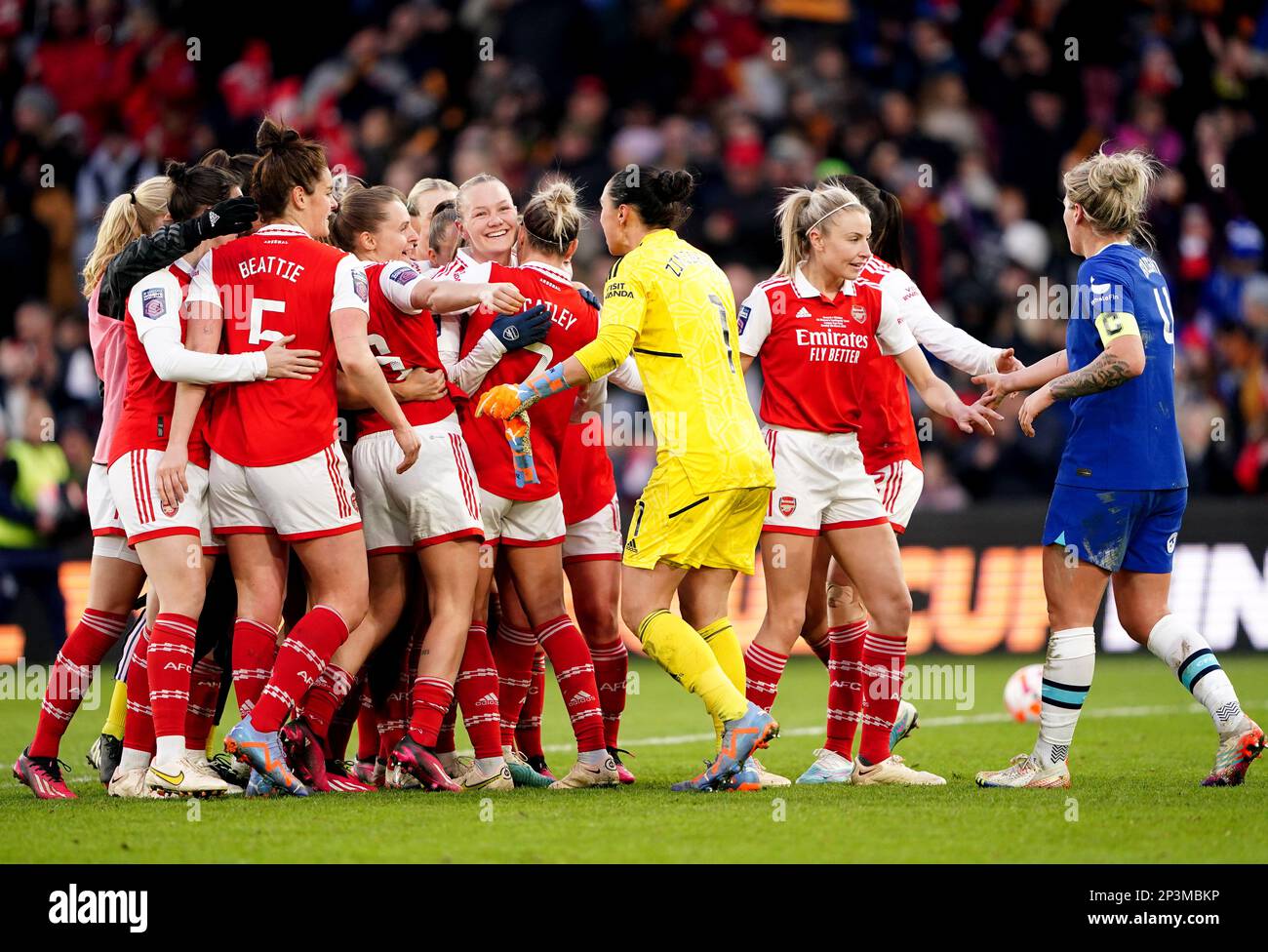 Arsenal's Leah Williamson (second right) speaks to Chelsea's Millie ...