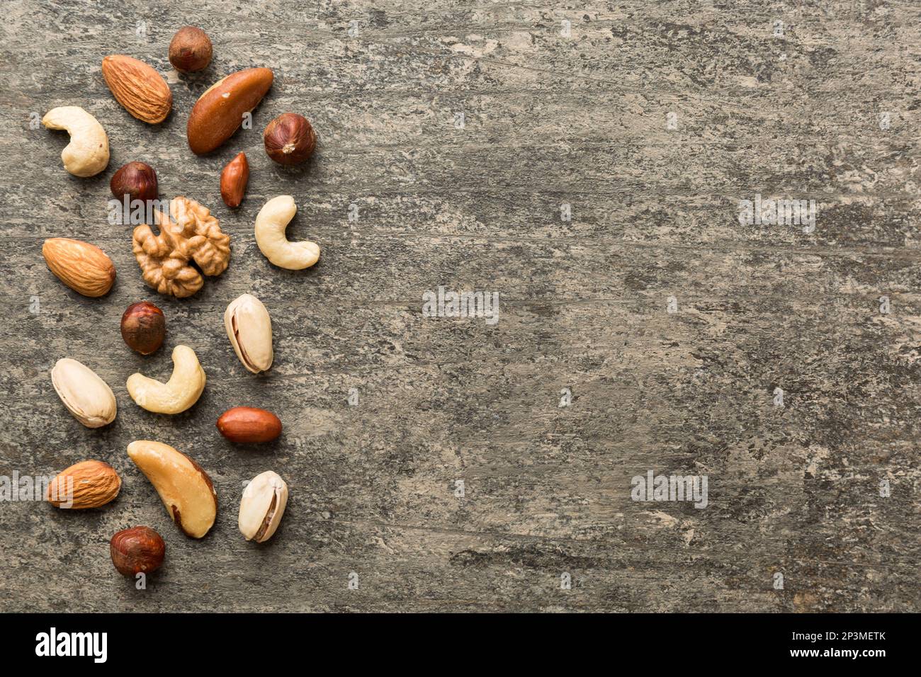 Composition of nuts , flat lay - mix hazelnuts, cashews, almonds on ...