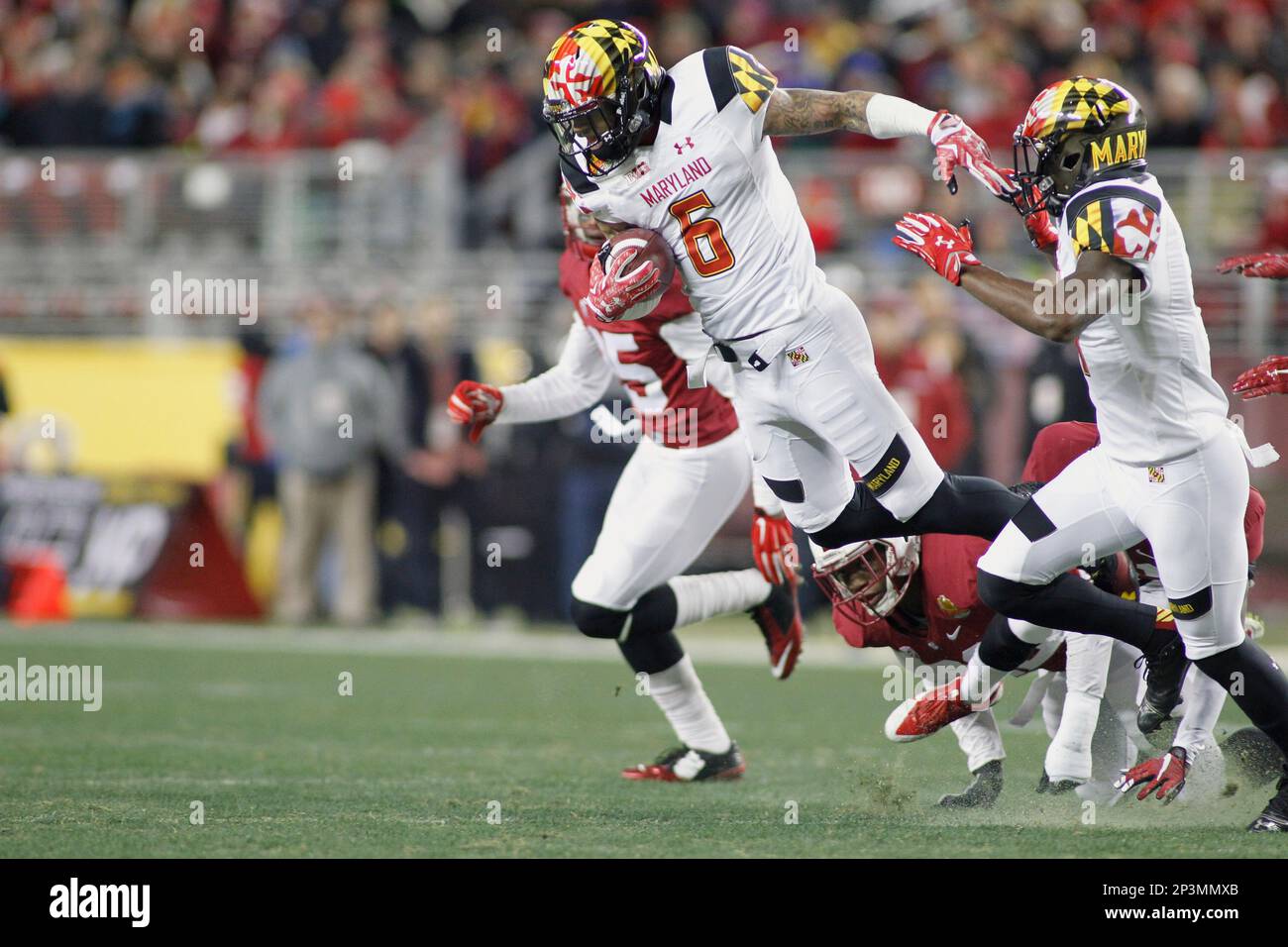 Dec 30 2014: Maryland WR Deon Long (6) gets tripped up during 1st half ...