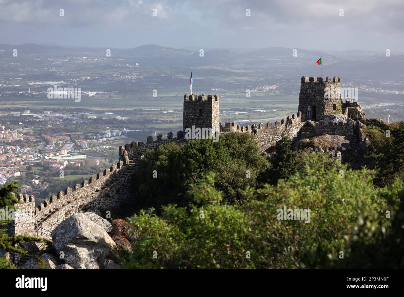 Walls and towers of the Moorish Castle with Serra de Sintra countryside ...