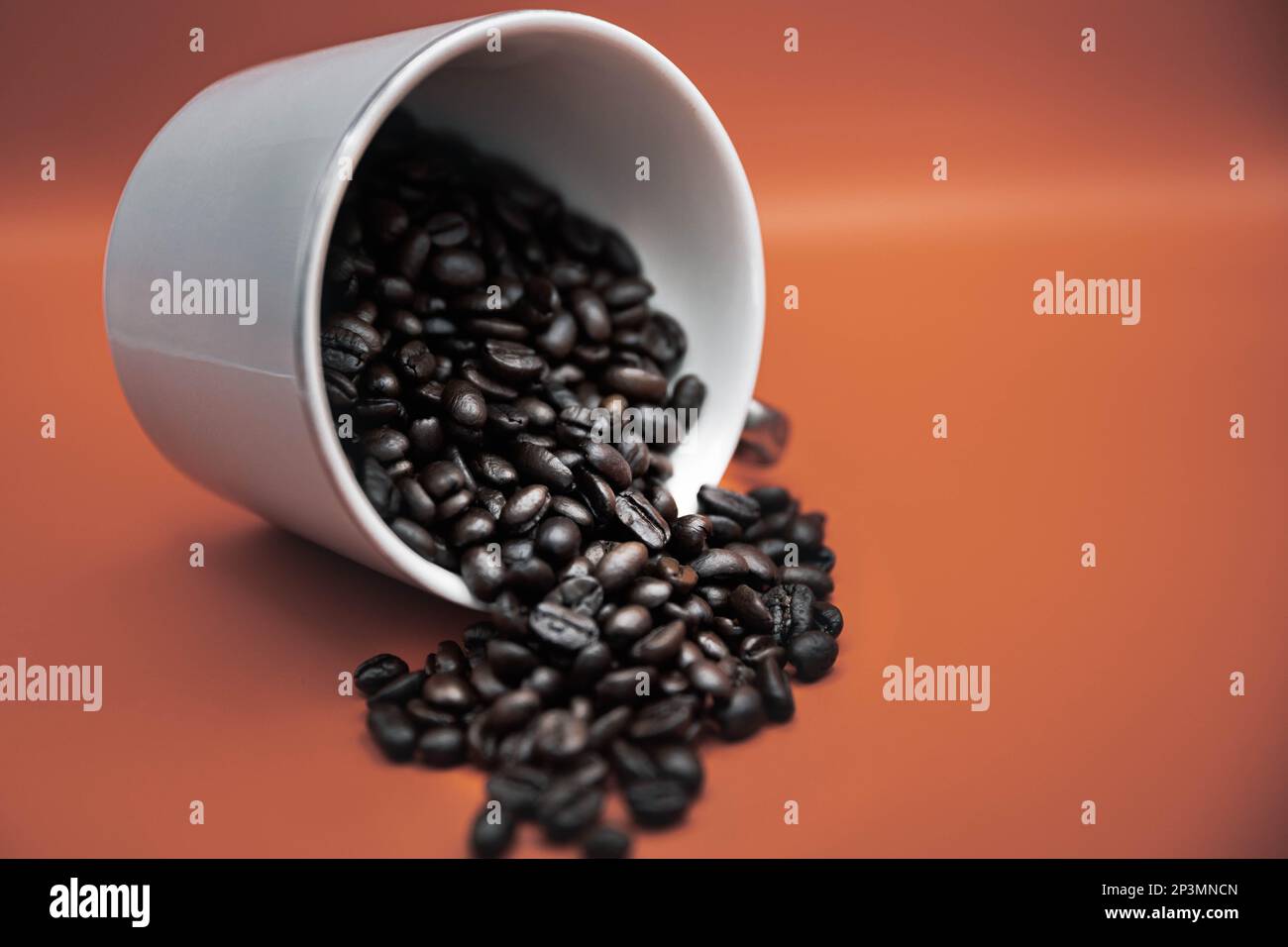 Coffee beans in a cup Stock Photo - Alamy